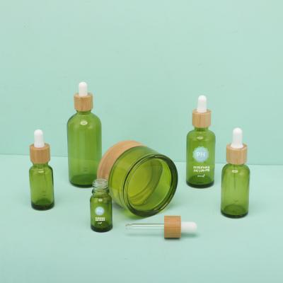 China Green Bamboo Essential Oil Dropper Bottle aluminum and plastic Collar for sale