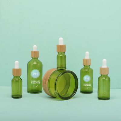 China Green Bamboo Essential Oil Dropper Bottle aluminum and plastic Collar for sale
