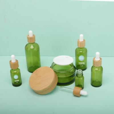 China Green Bamboo Essential Oil Dropper Bottle aluminum and plastic Collar for sale