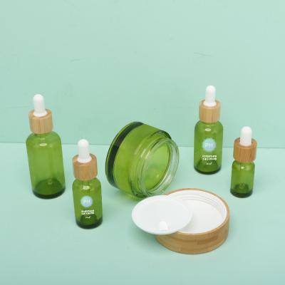 China Green Bamboo Essential Oil Dropper Bottle aluminum and plastic Collar for sale