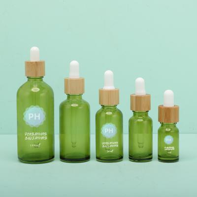 China Green Bamboo Essential Oil Dropper Bottle aluminum and plastic Collar for sale