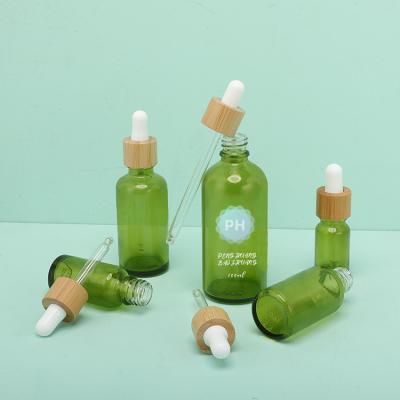 China Green Bamboo Essential Oil Dropper Bottle aluminum and plastic Collar for sale