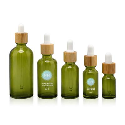 China Green Bamboo Essential Oil Dropper Bottle aluminum and plastic Collar for sale