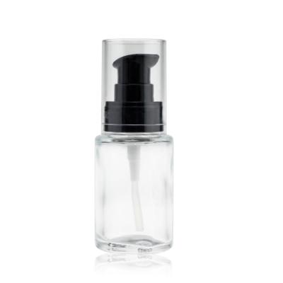 China 30ml Round Shape Glass Empty Foundation Bottle With Press Pump for sale
