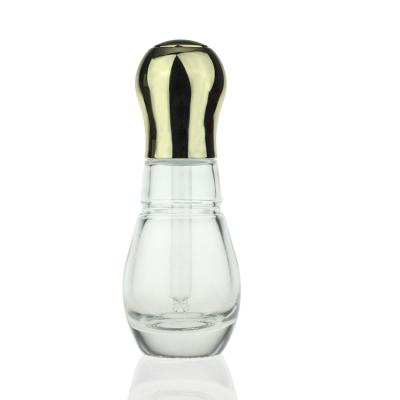 China Gold Spray Gold Cap Serum Glass Bottle 30ml for sale