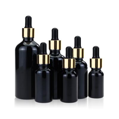 China Empty Violet Black Dropper Screw Cap Glass Bottle for Essential Oil Hair Oil for sale