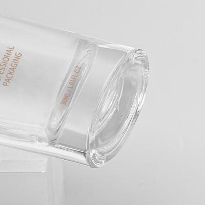 중국 명백한 30 밀리람베르트 리퀴드 파운데이션 병 유리 펌프 결빙 표면 판매용