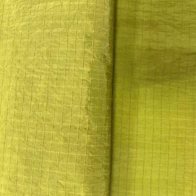 China Water Repellent Coated Fabric Shiny Metal Coated 210D UHMWPE Gridstop Nylon for Jacket for sale