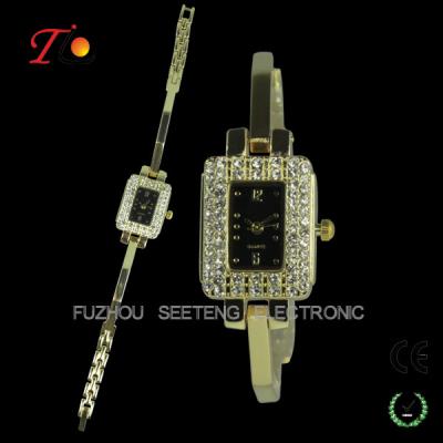 China Diamond inset case and metal band  slim stone quartz watch for ladies for sale