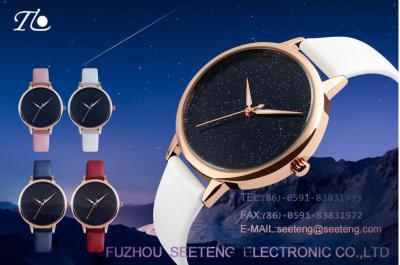 China Simple and clean starry sky dial golden alloy case ladies watch with colorful pu leather strap for sale