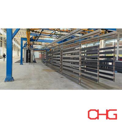 Cina Linea di rivestimento in polvere di scaffali metallici automatici con sistema di trasportatore senza energia e forno di raffinazione in vendita