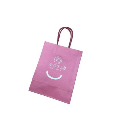 China Pink Twisted Handle Paper Bag Customized Branded Paper Bags Recyclable for sale