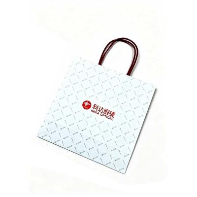 China Custom Size Twisted Handle Paper Bag White Paper Bags With Twisted Handles for sale