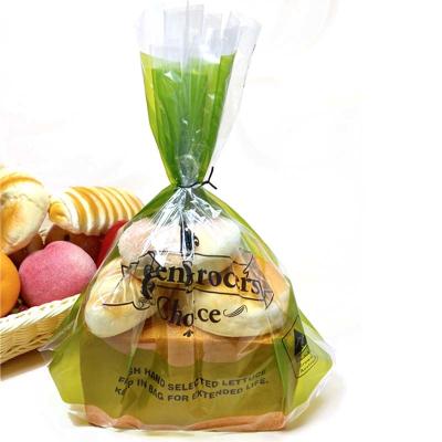 China Custom Logo Clear Twist Tie Bags Moisture Resistant Bread Plastic Bags Food Grade for sale