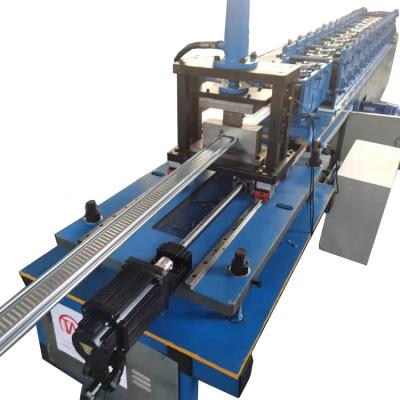 China Hydraulic Cutting 18 Station Shutter Door Roll Forming Machine 0-15m/min Roller Speed for sale