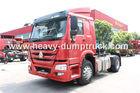 Cina La testa del trattore da 371 cavallo vapore di Howo 4X2 trasporta ZZ4187S3511W su autocarro per la trazione del rimorchio basso dei semi del letto in vendita