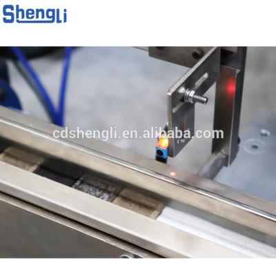 China Elektrisch aangedreven dubbel draaiende snoep-chocolademachine voor snoepverpakkingslijn Te koop