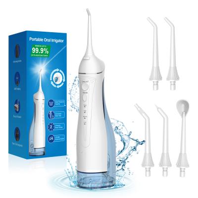 China Handheld Cordless Rechargeable Water Flosser With Large Tank And 5 Nozzle Tips for sale