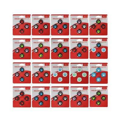 China Cartoon Cute Cat Paw Pattern Silicone Thumbstick Caps for Nintendo Switch 2 4 in 1 Blister Package for sale