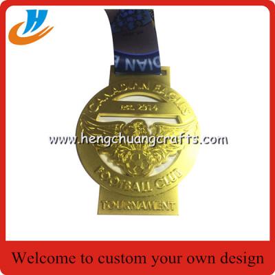China Matt gold plated medals custom,ribbon medals with football logo design sports medals for sale