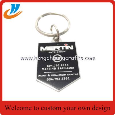 China Custom design soft enamel metal keychain/double side plated silver with ring for sale