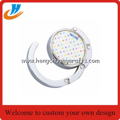 China Custom epoxy bag hanger hook,bag holder with print your own logo for sale