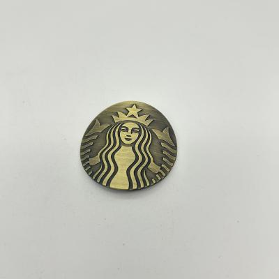 China Customized Starbucks Mermaid Logo Metal Commemorative Badge / Coin,The overall color is antique bronze and it is in an oval shape. for sale