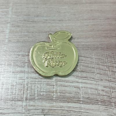 China Hello Kitty Apple Shaped Gold Enamel Pin, Sanrio Character Collectible Lapel Pin for sale