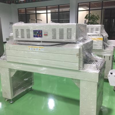 中国 半自動ヒート シールの収縮の覆いのトンネルの包装は収縮包装機械を 販売のため