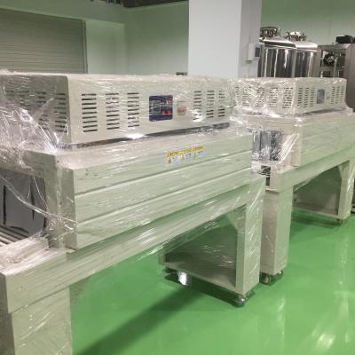 中国 半自動ヒート シールの収縮の覆いのトンネルの包装は収縮包装機械を 販売のため