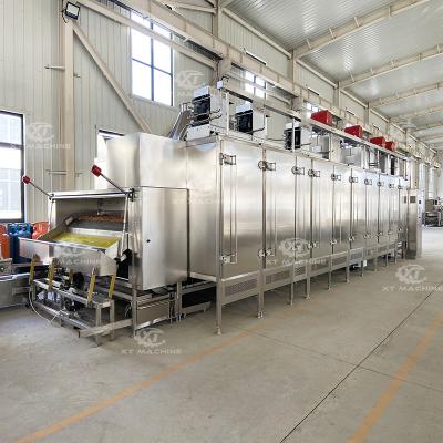 China Adjustable Temperature Belt Type Peanut Roasting Machine with Powerful Cooling Function for sale