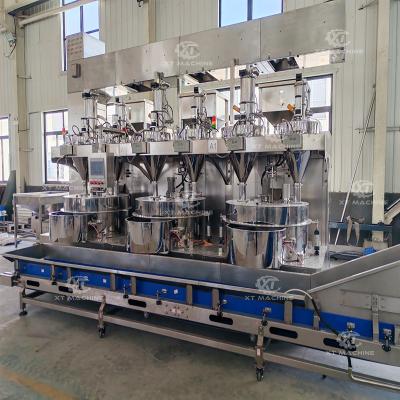 Cina Linea di produzione automatica completa per rivestimento e frittura di arachidi, impianto di produzione per frittura e rivestimento di frutta secca in vendita