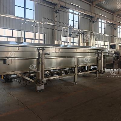 China Máquina freidora automática industrial profesional de nueces para el procesamiento de hojuelas de yuca y maíz en venta
