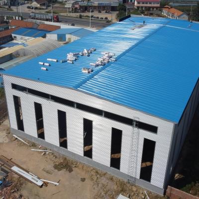 China Prefab Light Span Steel Warehouse with Truss Roof for sale