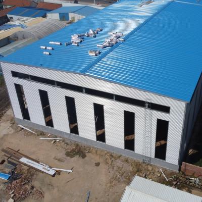 China Prefab Steel Warehouse 150m x 40m with Glass Wool Sandwich Panels for sale