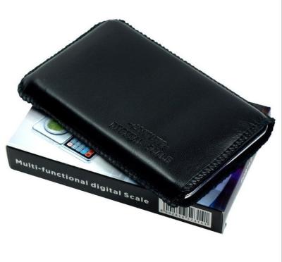 China 0.01g High Accuracy Jewelry Scale with Counting Function Blue Screen Display and Clock Temperature Digital Pocket Scale for sale