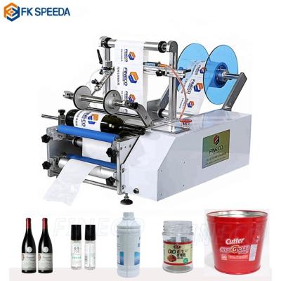 China Máquina de rotulagem semiautomática de garrafas redondas para garrafas pequenas à venda