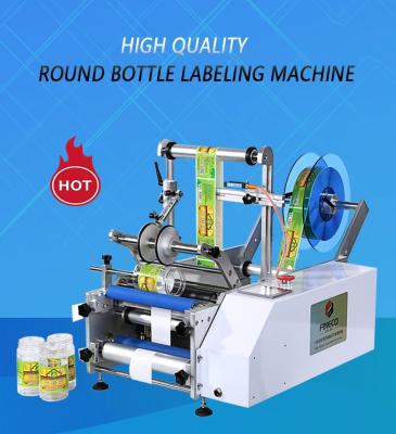 China Semi-automatische ronde flessen etiketteringsmachine voor het omwikkelen van etikettering van honingjam pot Te koop