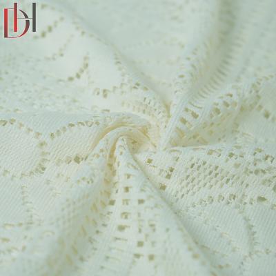 China Custom Breathable Eco-Friendly Lightweight Polyester Jacquard Mesh Knit Fabric For High End Dress Garment for sale