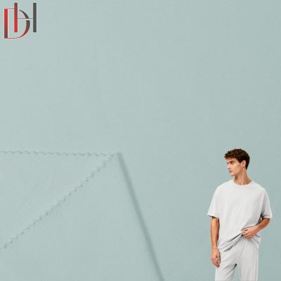 China Custom Super Combed Double Yarn Pure Cotton Piqué Fabric for Polo Shirts and High Quality Sportswear Manufacturing for sale