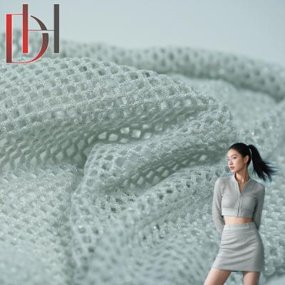 China Soft Semi Sheer Diamond Jacquard Mesh Fabric For Women Fashion Layer for sale