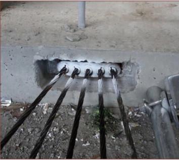 Cina il calcestruzzo precompresso dell'acciaio di tensione della posta di 12.7mm collega la testa ed il cuneo con un manicotto piani dell'ancora in vendita