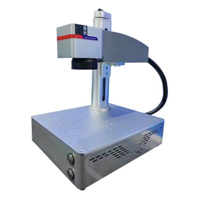 China Desktop Fiber Laser Marking Machine 20w 30w 50w Small Laser Engraving Machine For Metal for sale