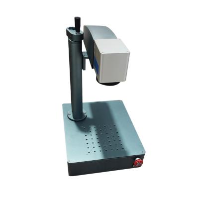 China Desktop Fiber Laser Marking Machine 20w 30w 50w Small Laser Engraving Machine For Metal for sale