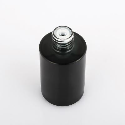 Cina Flacone contagocce per olio essenziale di siero per imballaggio cosmetico di design innovativo moderno rotondo in vetro smerigliato nero da 30 ml 1 Oz in vendita