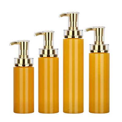 China Frasco de plástico personalizado para loção corporal para animais de estimação xampu recipiente de gel de banho com bomba de ouro 350 ml à venda