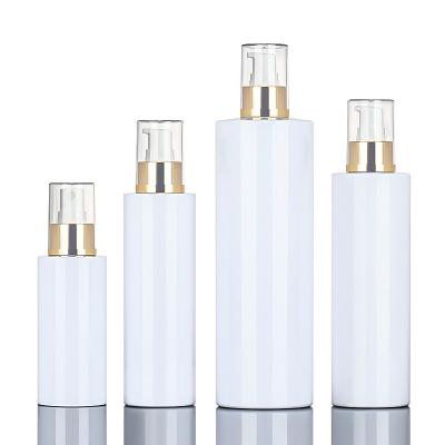 China Frasco de bomba de spray de loção de estampagem a quente Frasco de cosmético dourado à venda