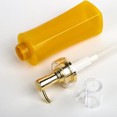 Cina l'ente vuoto Kylie Skin Care Shower Gel senz'aria della lozione di colore giallo di lusso di 350ml 500ml imbottiglia con la pompa dell'oro in vendita