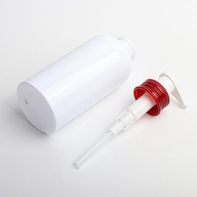 Cina bottiglie rotonde di plastica della lozione del contenitore della pompa di 350ml 500ml dello sciampo del lavaggio vuoto rosso bianco del corpo in vendita