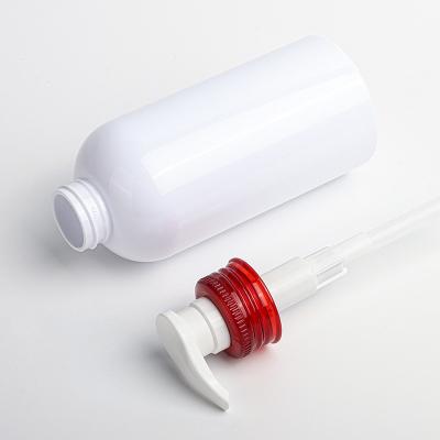 Cina bottiglie rotonde di plastica della lozione del contenitore della pompa di 350ml 500ml dello sciampo del lavaggio vuoto rosso bianco del corpo in vendita